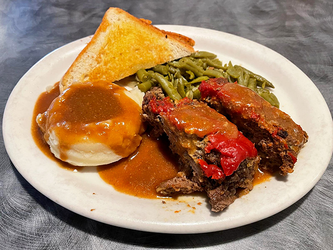 Meatloaf that would make your grandmother simultaneously proud and jealous. Those red pepper accents aren't just for show &ndash; they're flavor beacons.