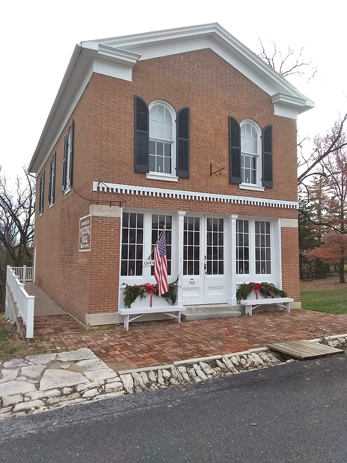 This brick beauty dressed in holiday finery proves patriotism and preservation make perfect partners. Norman Rockwell, your painting has come to life.