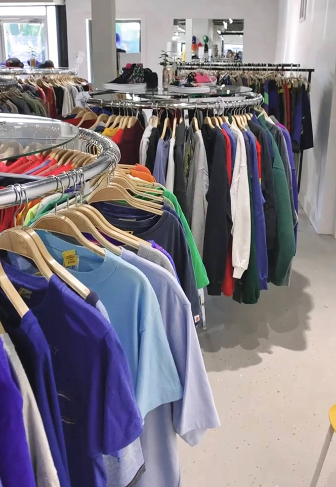 Circular racks of men's clothing prove guys finally get the shopping experience they deserve at prices that make sense.