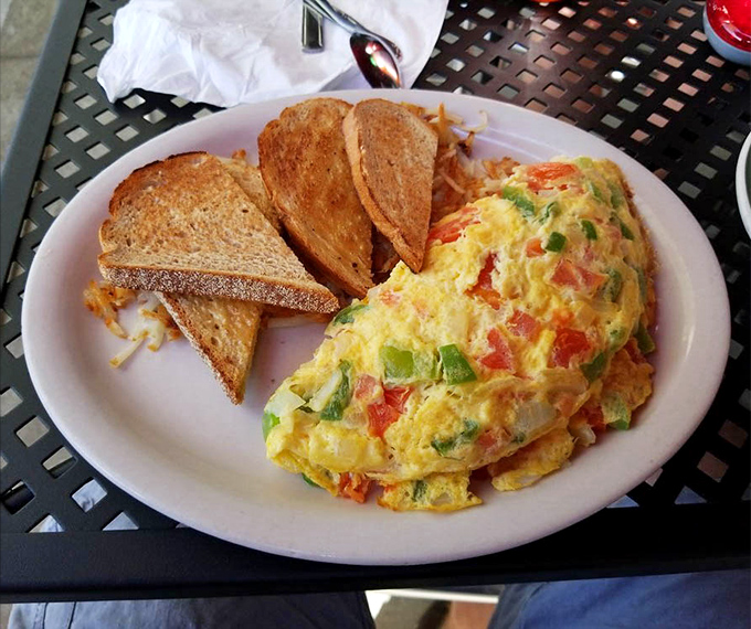 Colors that pop and flavors that dance&mdash;this omelet brings the fiesta to your morning with enough cheese to make Wisconsin proud.