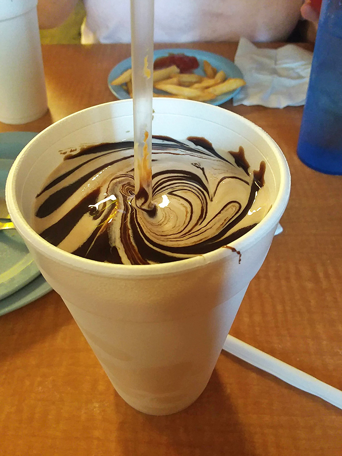 That hypnotic swirl of chocolate in vanilla isn't just a milkshake—it's a drinkable work of art that puts museum pieces to shame.