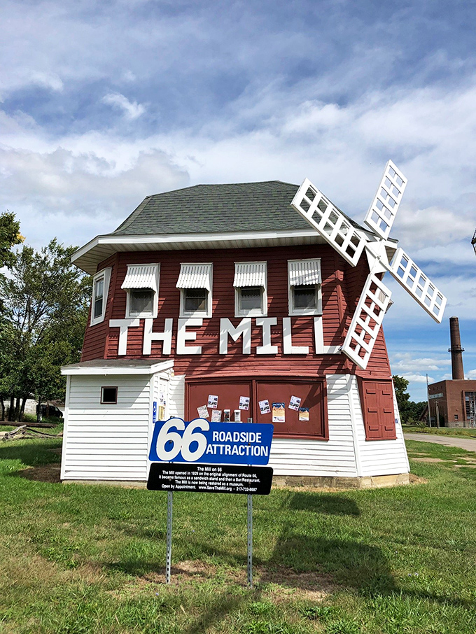 "The Mill" stands as a quirky Route 66 landmark, its white windmill arms reaching skyward. This red roadside attraction proves that small towns often hide the most Instagram-worthy surprises.
