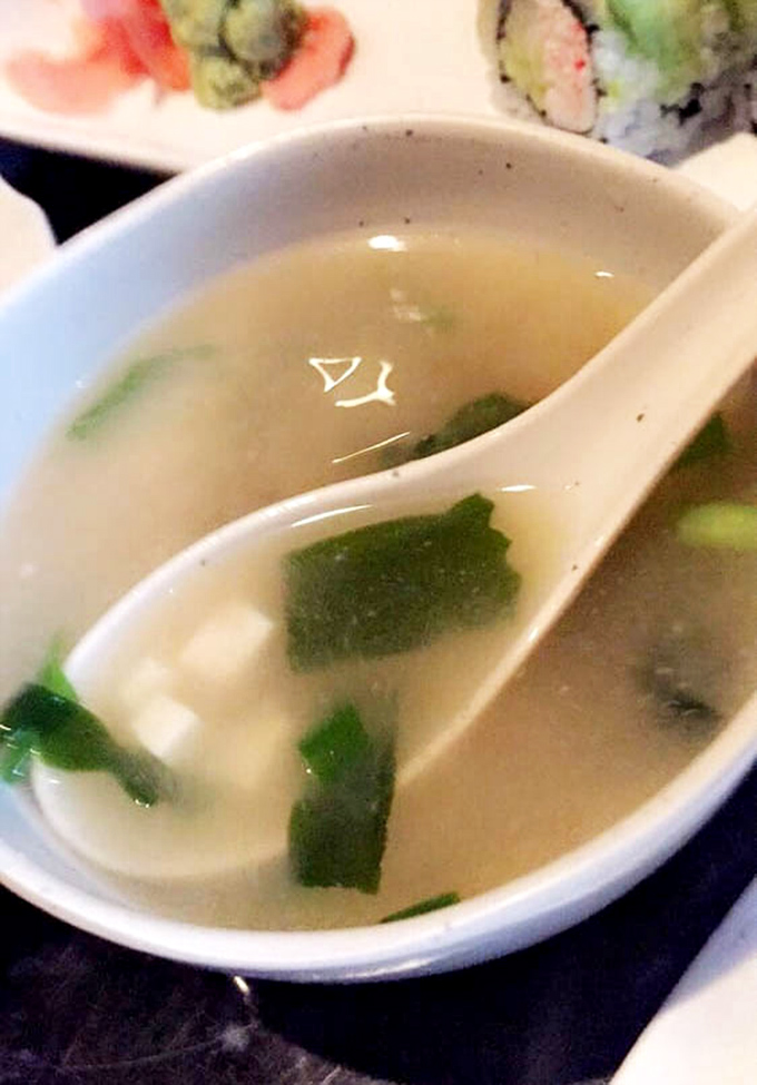 The humble miso soup&mdash;a warm, umami-rich prelude to the symphony of flavors that awaits. Comfort in a bowl.