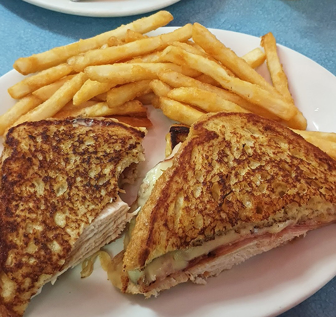 This grilled sandwich isn't just good, it's a masterclass in the art of bread-to-filling ratio and proper golden-brown execution.