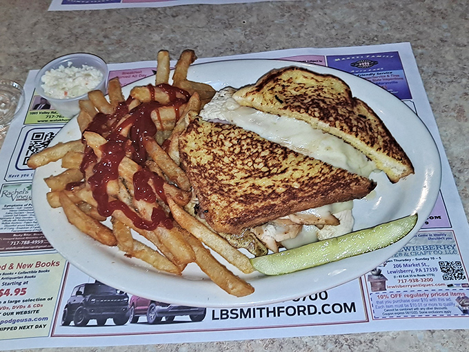 The Monte Cristo: where breakfast and lunch have their most delicious argument, with crispy fries playing mediator.