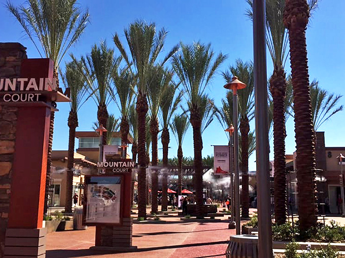 Mountain Court's towering palms create natural shade corridors. Mother Nature's air conditioning complements the human-made variety inside the stores.