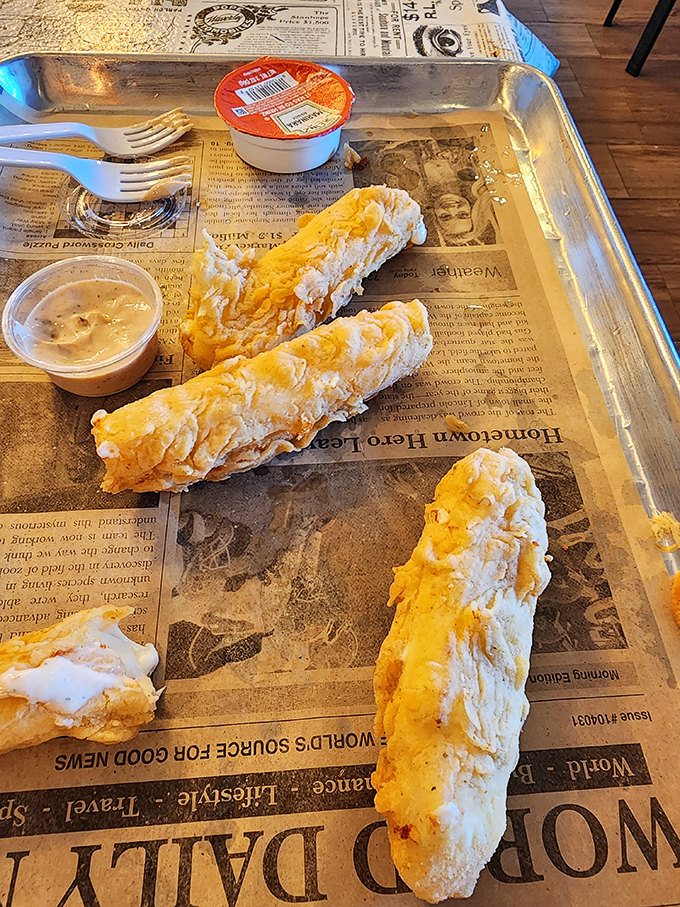 The mozzarella sticks that launched a thousand road trips. Crispy exterior, molten interior, and a stretch factor that defies both physics and willpower.