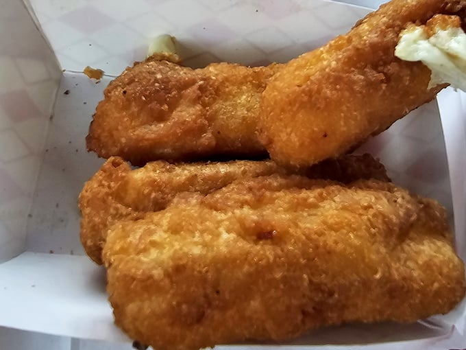 These mozzarella sticks aren't just appetizers; they're golden-crusted ambassadors from the Republic of Deliciousness.