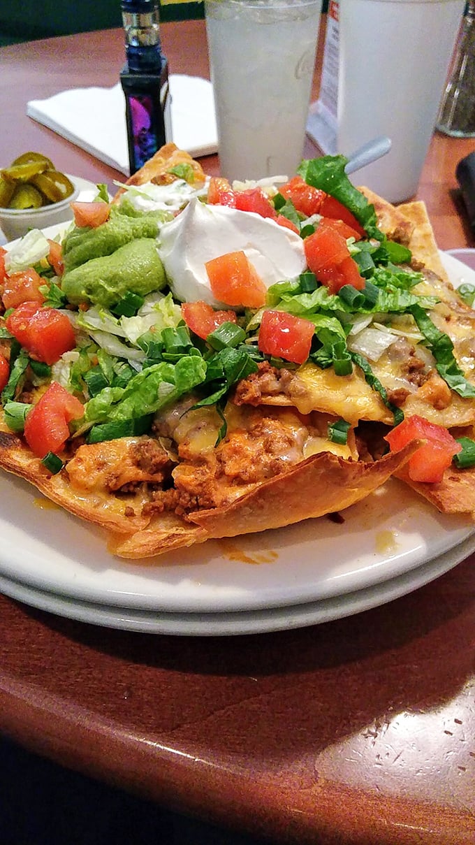 These loaded nachos aren't messing around&mdash;they're the architectural marvel of appetizers, where every layer reveals another reason to keep digging.