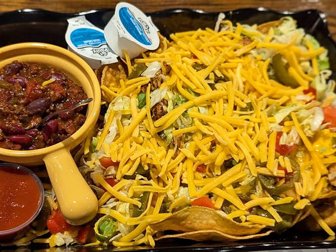 These nachos aren't messing around—loaded with enough cheese to make Wisconsin proud and chili that could warm you through a Pennsylvania winter.