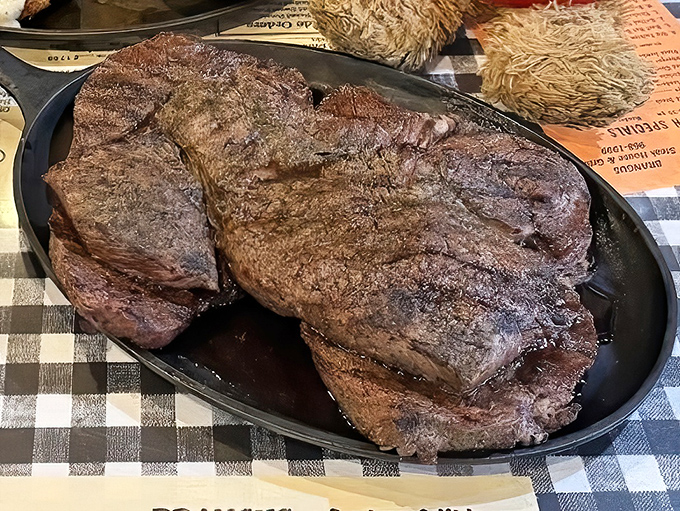 The New York Strip arrives like a magnificent island in a sea of possibility. Those grill marks aren't decoration&mdash;they're badges of honor.