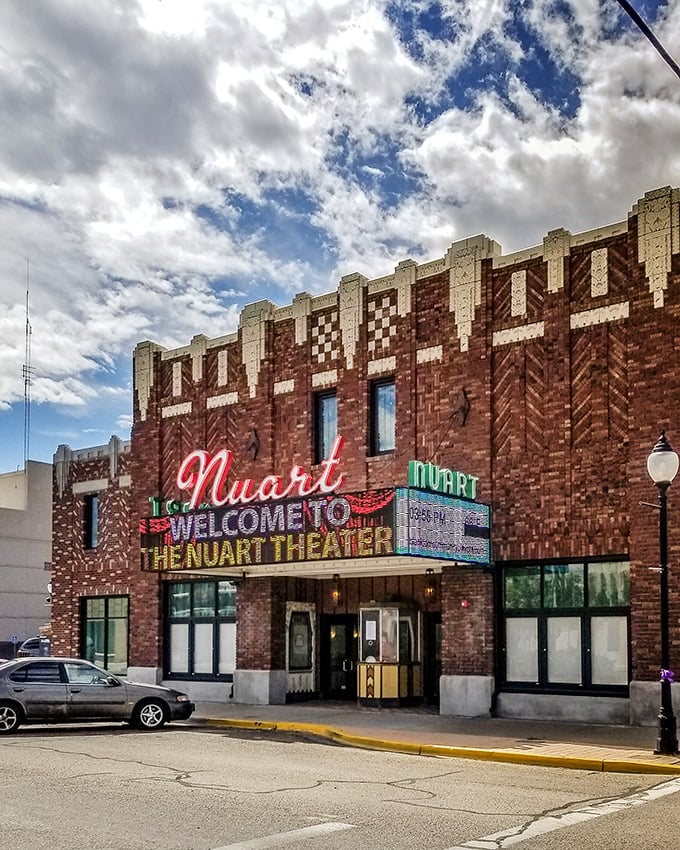 The historic Nuart Theatre stands as a brick-and-mortar reminder that entertainment doesn't require streaming subscriptions or complicated remote controls.