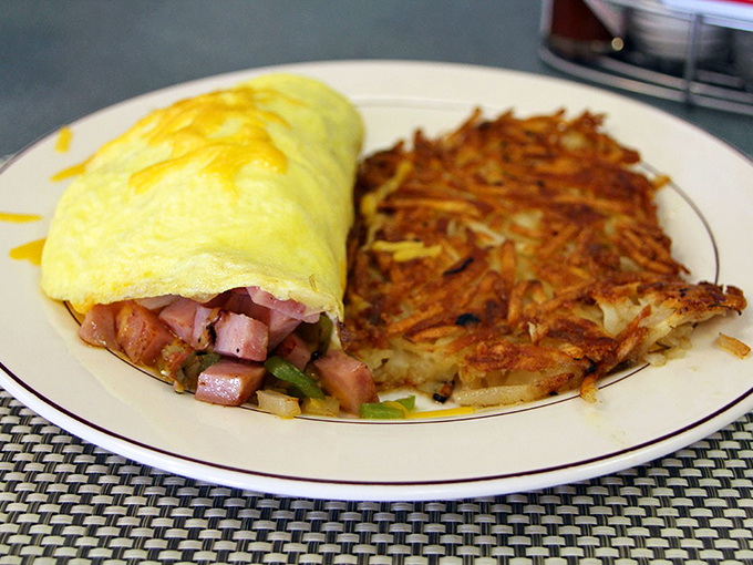 This ham and veggie omelet with crispy hash browns is breakfast architecture at its finest&mdash;precisely engineered for maximum morning happiness.