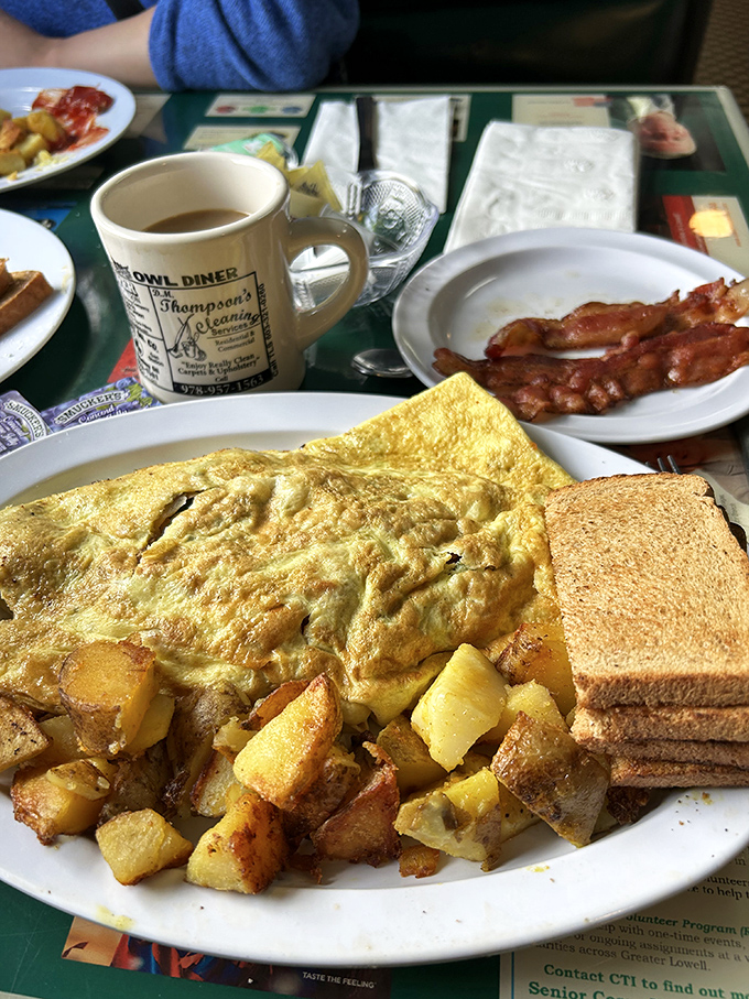 Breakfast of champions! This fluffy omelet with crispy home fries and perfectly toasted bread is the morning motivation we all need