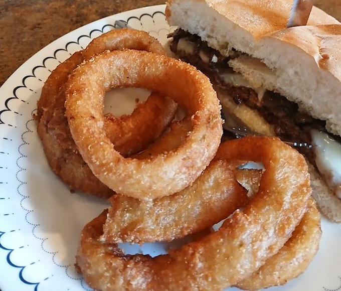 Those onion rings aren't just sides – they're golden halos of happiness that deserve their own special place in the Wisconsin food hall of fame.