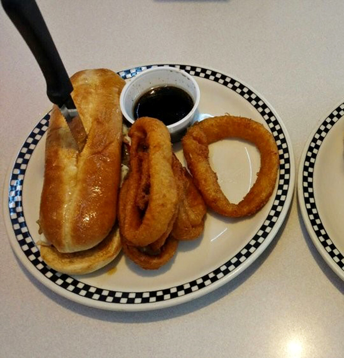 These onion rings aren't just side dishes, they're golden halos of crispy perfection that make you wonder why vegetables ever bothered trying to be healthy.