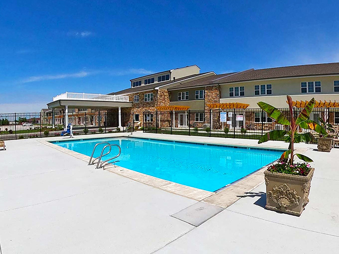 Who said retirement can't include poolside lounging? This sparkling oasis makes Florida snowbirds question their life choices.