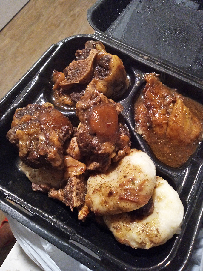 Oxtail so tender it practically surrenders to your fork, paired with dumplings that could make a carb-counter weep with joy.