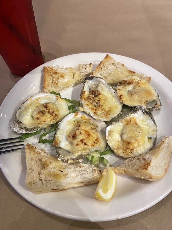 Oysters Rockefeller &ndash; where briny treasures meet buttery, cheesy decadence. These little jewels make you forget you're hundreds of miles from any coast.