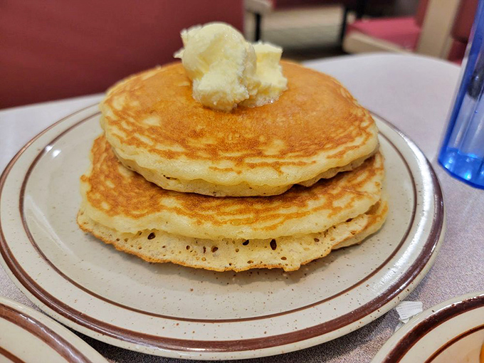Golden pancakes stacked high with a melting pat of butter&mdash;architecture so beautiful it should require a building permit.