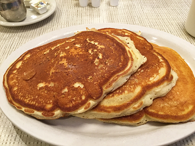 These golden-brown pancakes aren't just breakfast, they're edible sunshine&mdash;the kind of simple perfection that makes Monday mornings bearable.