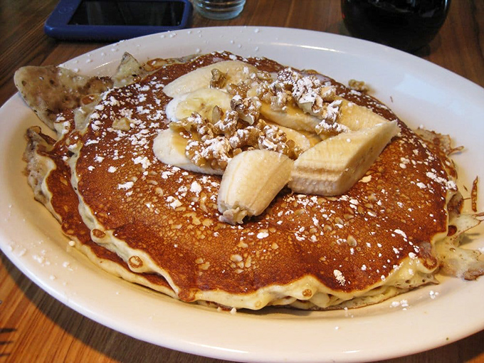 Pancake artistry at its finest. Fresh bananas and walnuts create a breakfast symphony that Mozart would have composed had he been a chef.