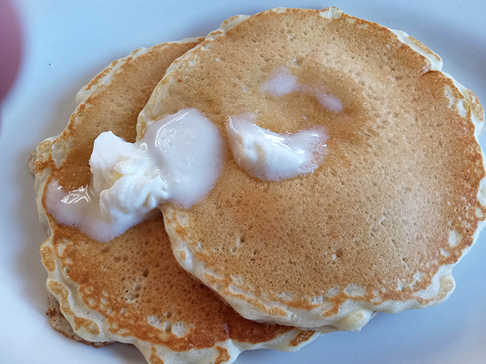 Golden pancakes with melting butter&mdash;proof that sometimes the simplest pleasures are the ones worth crossing county lines for.