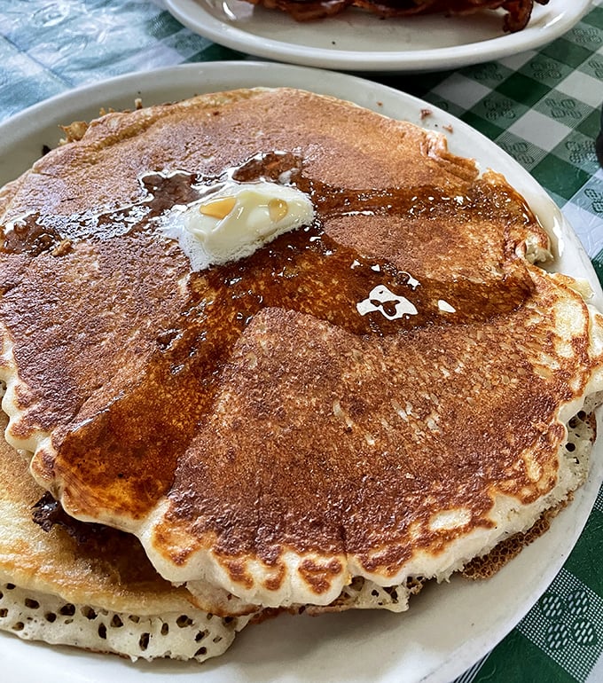 These pancakes aren't just big&mdash;they're Nebraska big, with a pat of butter slowly melting into a golden landscape of breakfast perfection.