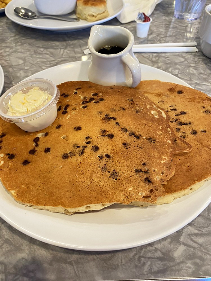 This pancake isn't just large&mdash;it's the breakfast equivalent of a solar eclipse, temporarily blocking out all other food thoughts.