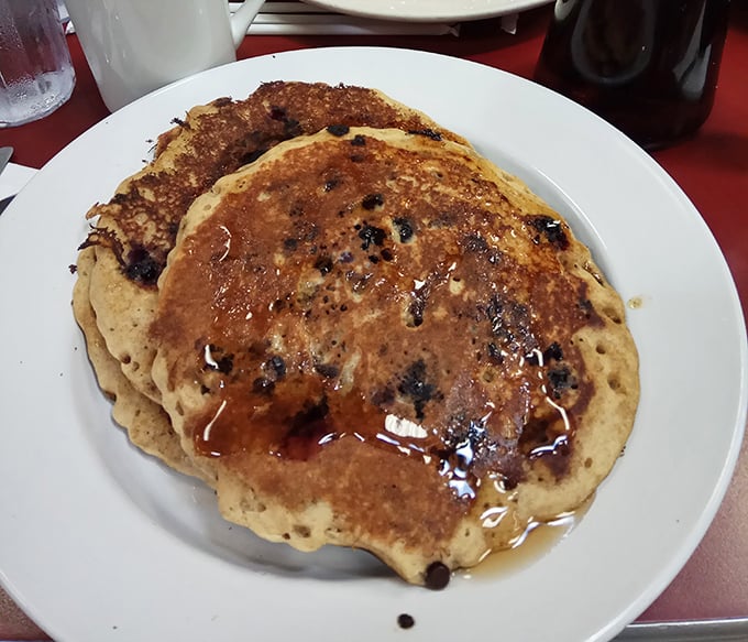 Blueberry pancakes that don't just sit on the plate&mdash;they perform, with maple syrup as their spotlight and butter as their standing ovation.