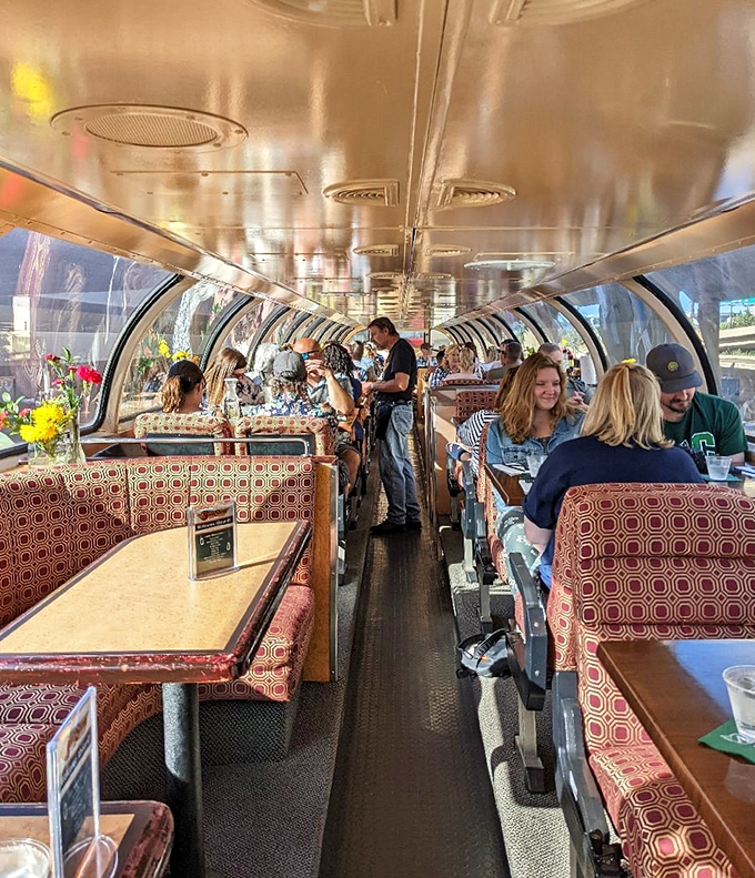 The dome car dining experience: where panoramic views of Minnesota's wilderness pair perfectly with every bite and sip.