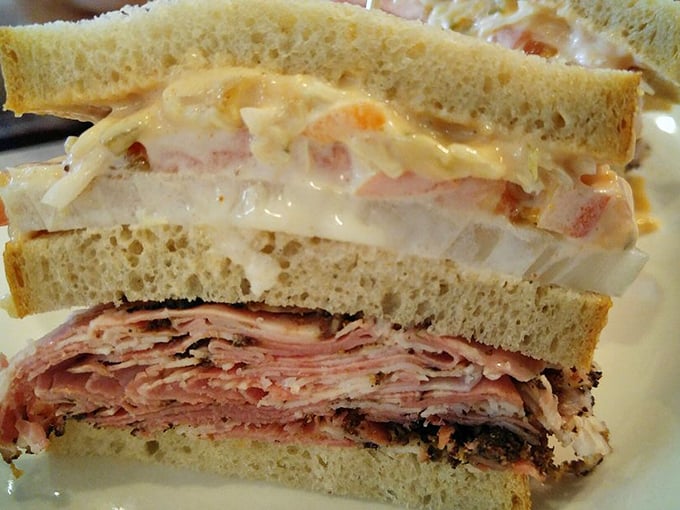 Two-handed eating required for this pastrami tower &ndash; the kind of sandwich that makes napkins surrender immediately.