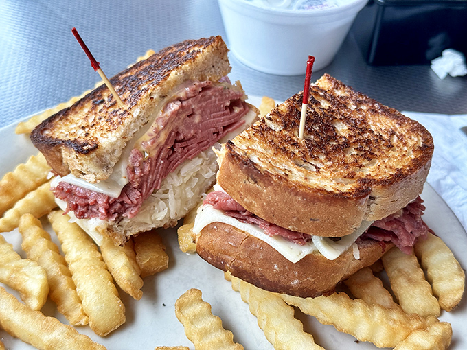 This isn't just a sandwich &ndash; it's architecture. Layers of warm pastrami, melty cheese, and toasted bread create the Taj Mahal of lunch options.