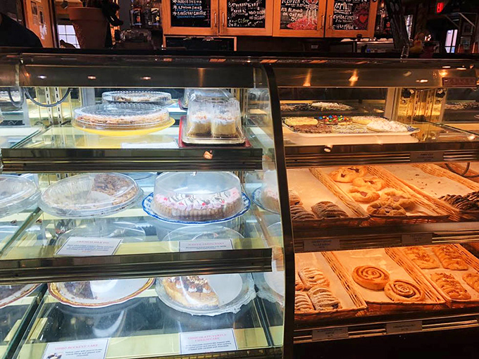 The pastry case at Angel Falls is like a treasure chest where calories don't count and decisions become deliciously impossible.