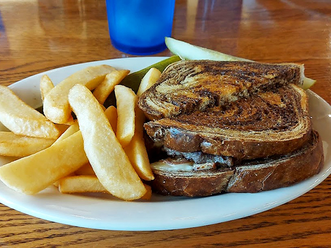 This isn't just a patty melt&mdash;it's a masterclass in the marriage of toasted marble rye, melted cheese, and perfectly seasoned beef. Comfort food royalty.