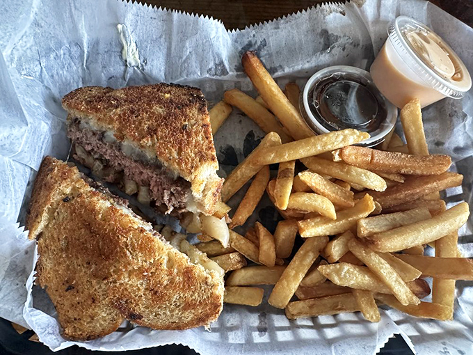 The patty melt: where burger meets grilled cheese in a beautiful marriage that would make any cardiologist nervously check their calendar.
