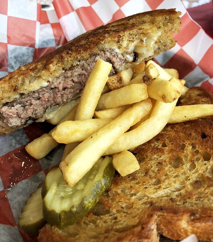 The patty melt: where burger meets grilled cheese in a beautiful union. That golden-brown rye bread deserves its own fan club.