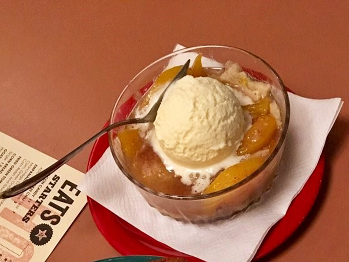 Fresh peach cobbler topped with vanilla ice cream is the sweet ending your barbecue feast absolutely deserves.