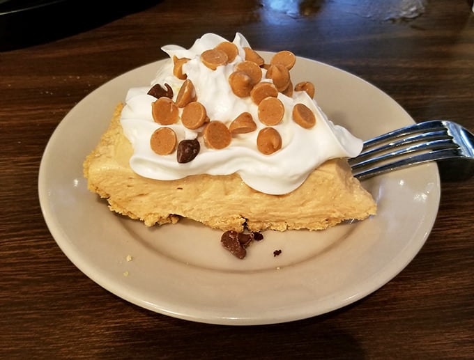 Peanut butter pie topped with whipped cream and chips&mdash;dessert that doesn't need a filter, just your undivided attention and possibly an extra napkin.