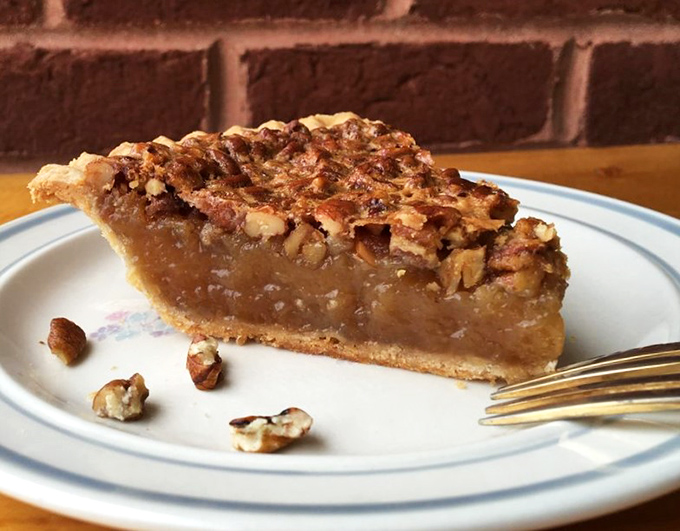 Pecan pie perfection&mdash;glistening filling topped with a mosaic of nuts. One bite and you'll understand why people drive across counties for this.