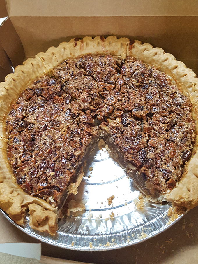 Pecan pie with that perfect flaky crust proves Louisiana knows its way around sugar and nuts as much as smoke.