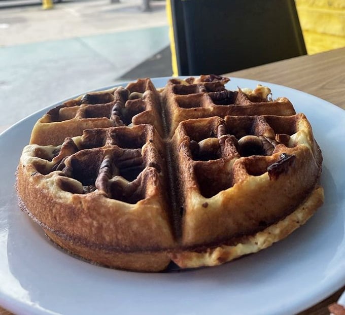 This waffle isn't just breakfast &ndash; it's architecture with purpose, each square pocket perfectly designed to hold maximum syrup capacity.