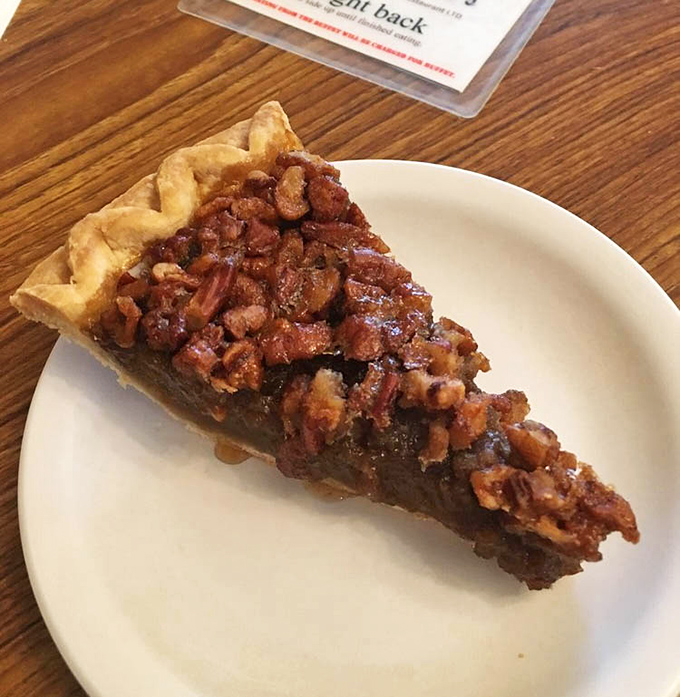 This isn't just pecan pie; it's a masterclass in the perfect filling-to-nut ratio. The kind of slice that demands a moment of respectful silence.