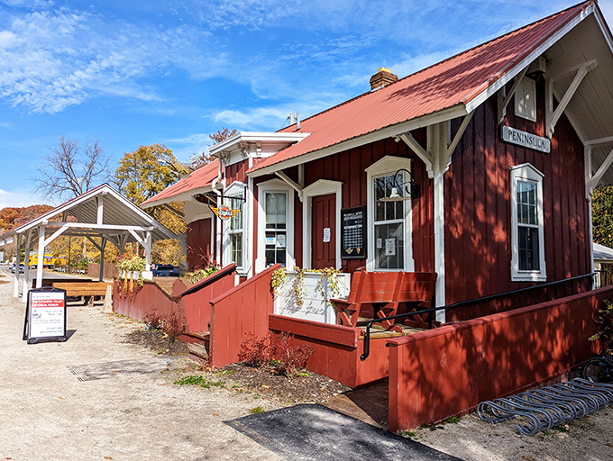 Peninsula's historic train depot stands proudly in its bright red glory, a reminder that sometimes the journey matters more than the destination.