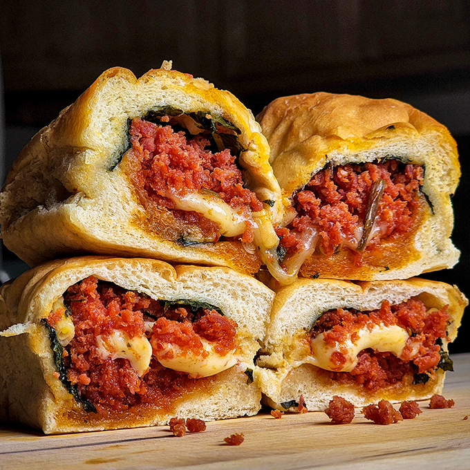 Pepperoni rolls sliced open to reveal their glorious filling&mdash;West Virginia's greatest contribution to portable breakfast foods and it's not even close.