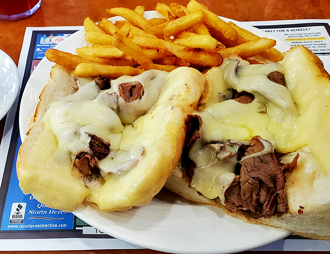 Melted cheese cascades over tender beef like a delicious avalanche you actually want to get buried under.