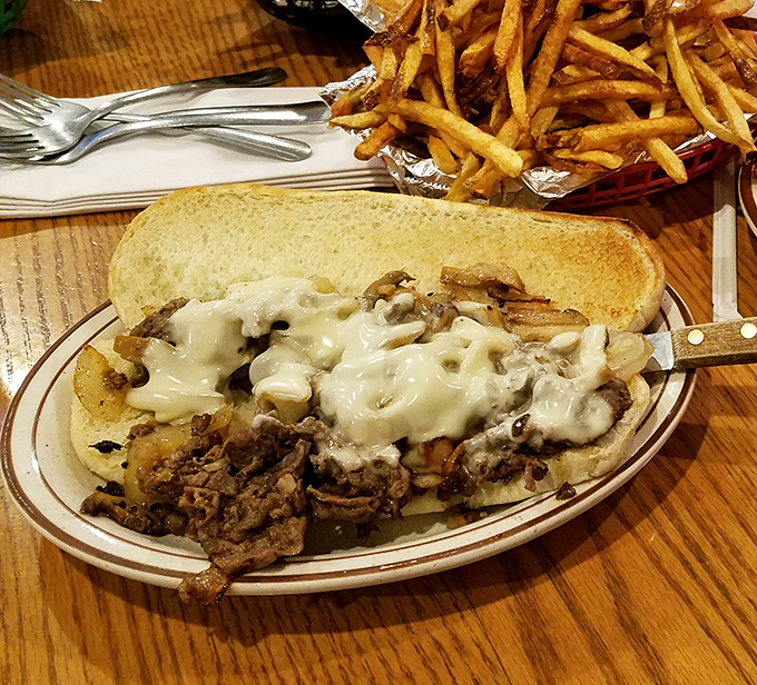 Melted cheese cascading over thinly sliced beef and grilled onions—a Philly cheesesteak that would make even the most die-hard Eagles fan nod in approval.