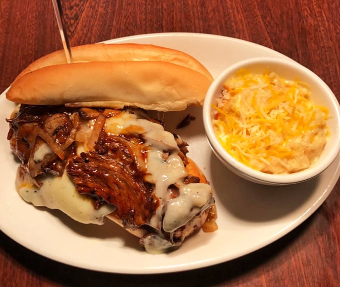 This isn't just a sandwich; it's Philadelphia's greatest cultural export reimagined in Missouri, where caramelized onions and melted cheese create harmony in every bite.