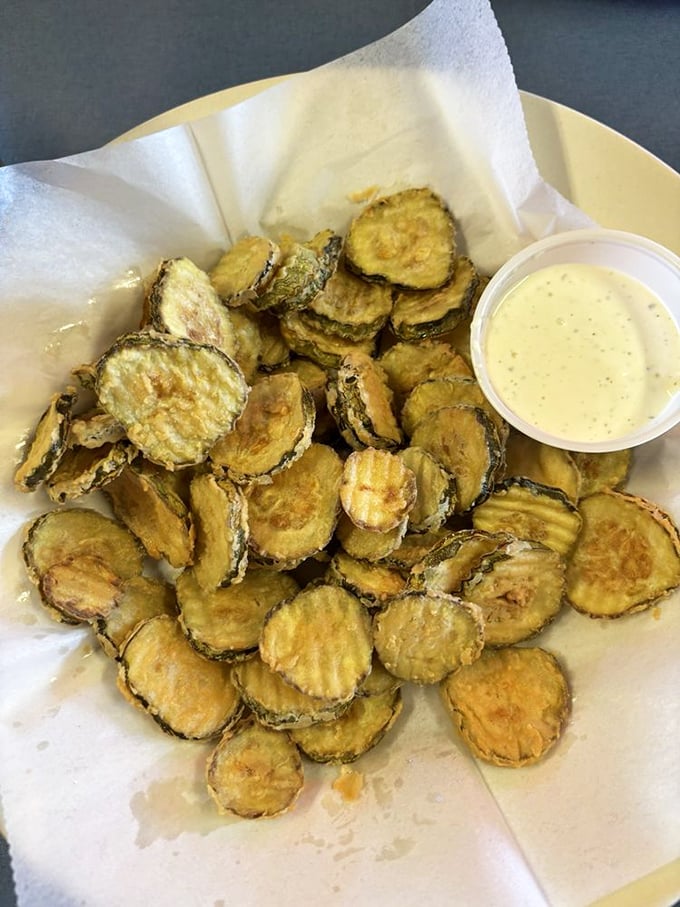 Crispy pickle chips that snap, crackle, and pop with each bite, paired with a creamy dip that makes vegetables seem downright sinful.
