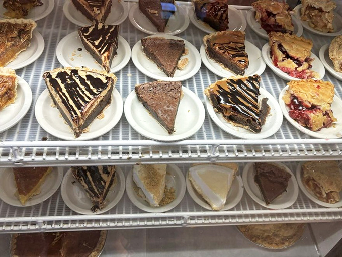The pie case &ndash; where diets go to die and happiness begins. Each slice represents someone's grandmother's recipe perfected over decades.